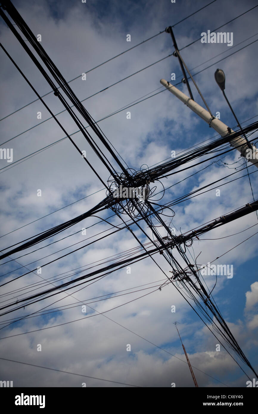 Cables and street light at a road intersection in Manila Stock Photo ...