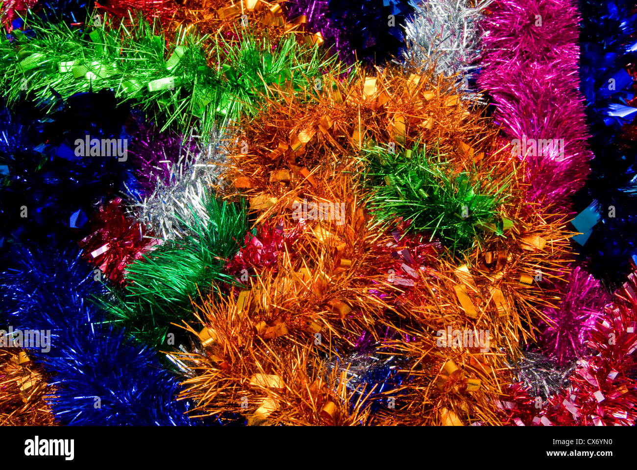 Rainbow Coloured Christmas Tinsel Texture Stock Photo - Alamy