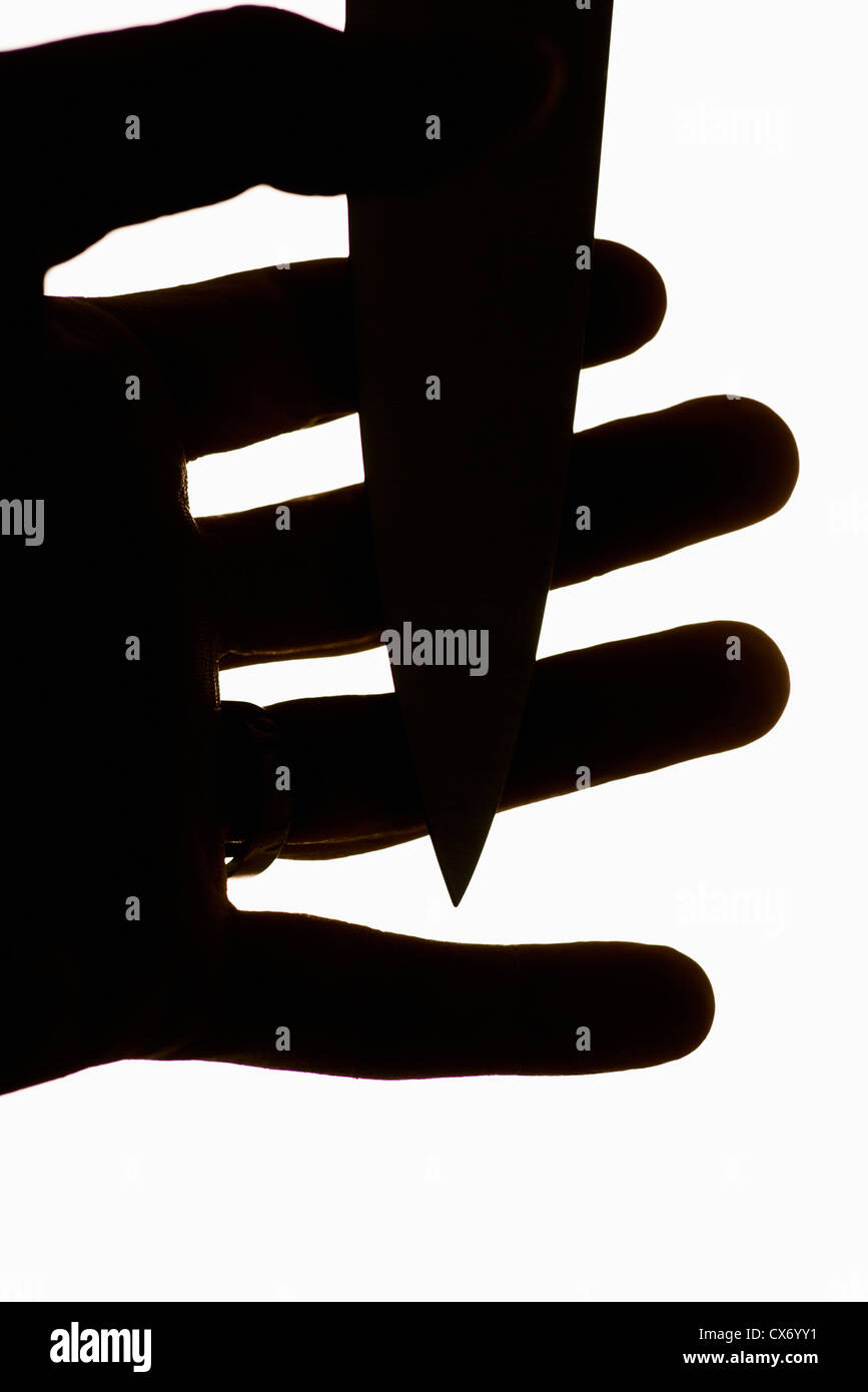 Silhouette man knife stabbing victim hi-res stock photography and ...