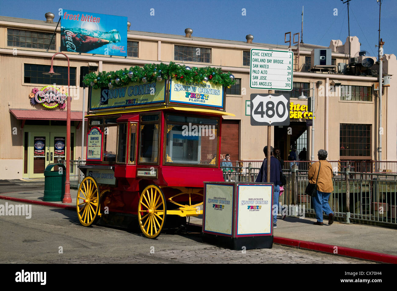 Old fashioned carriage selling Snow Cones with decorations around the ...