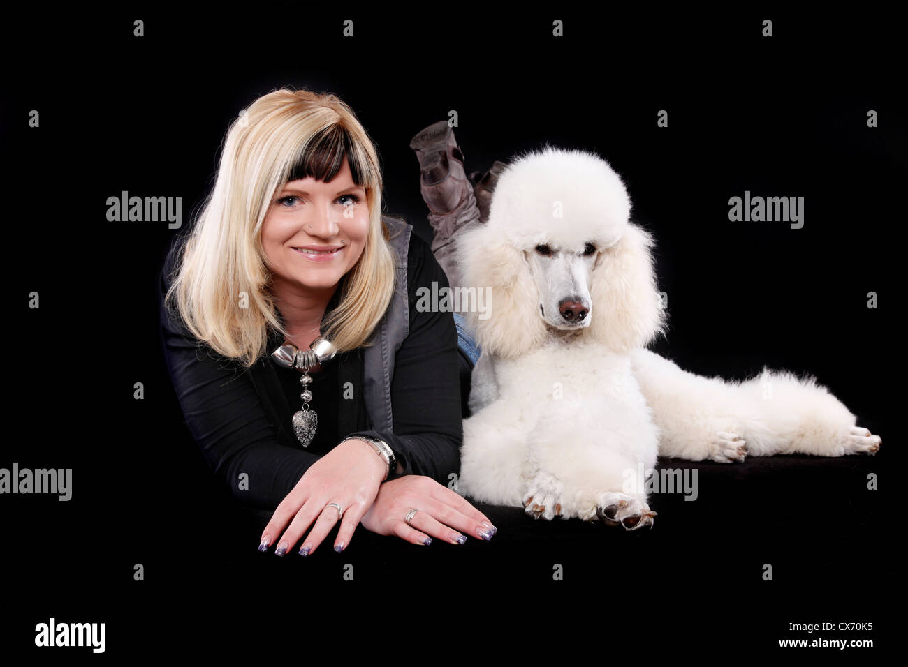 Woman poodles hi-res stock photography and images - Alamy