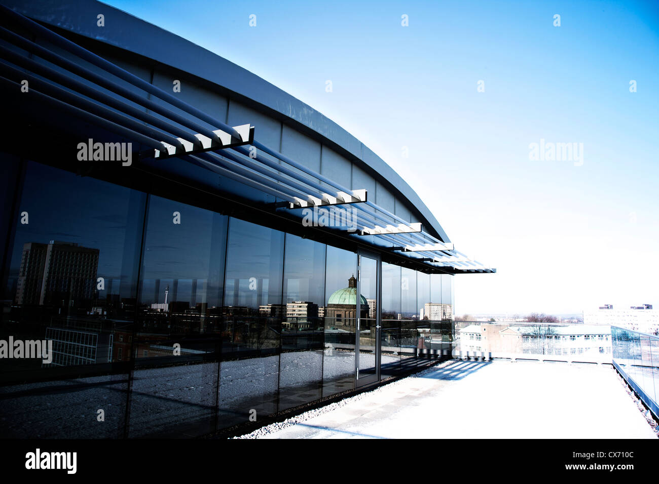 Reflection of Birmingham City Center in windows of building on Hagley ...