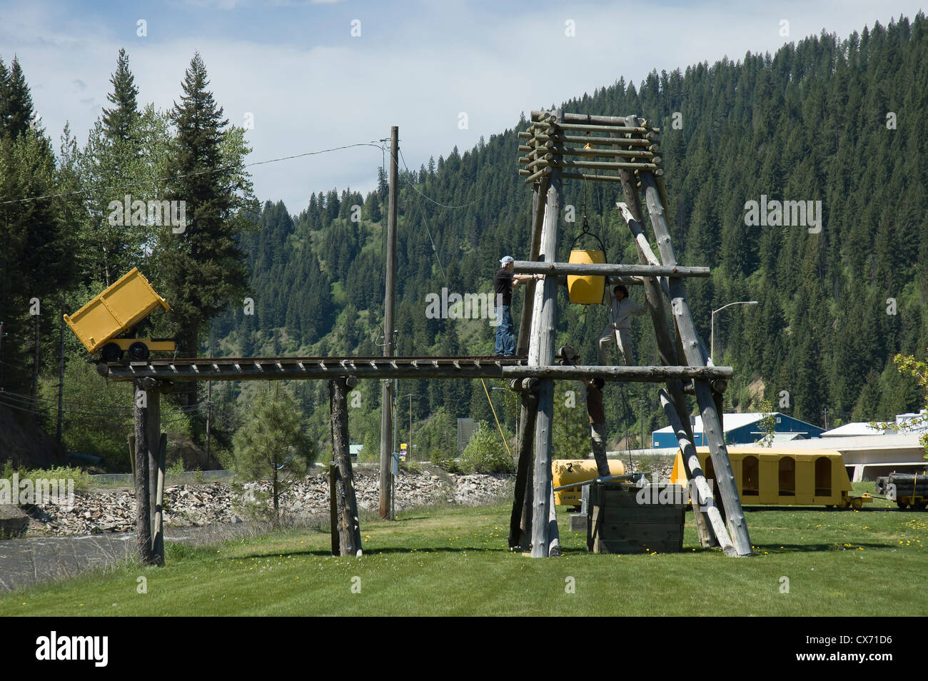 Young boy on the ladder of a Mule hoist used by prospectors at the ...