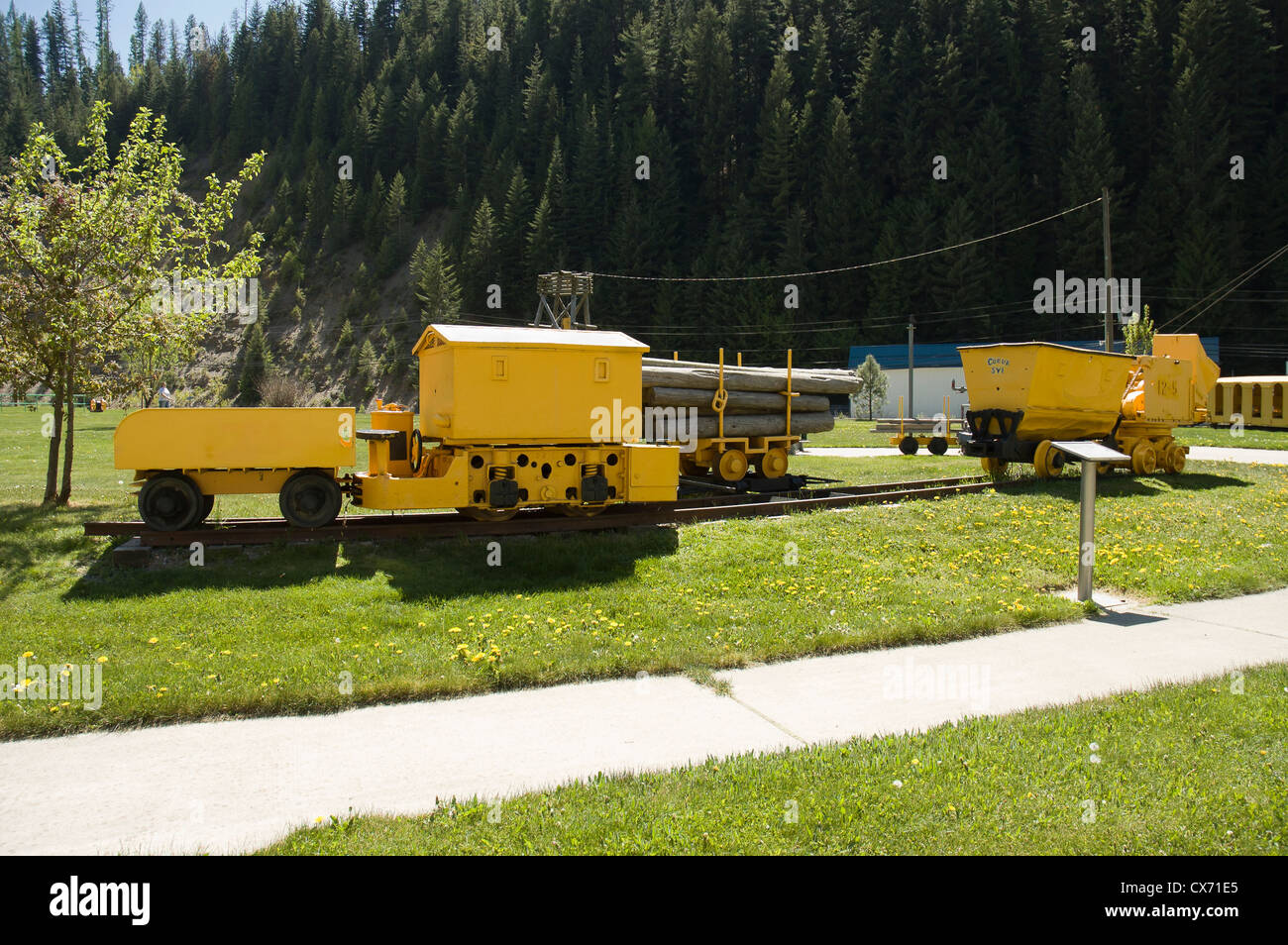 Eimco Mucker with ore car, timber car, and mine motor (locomotive ...