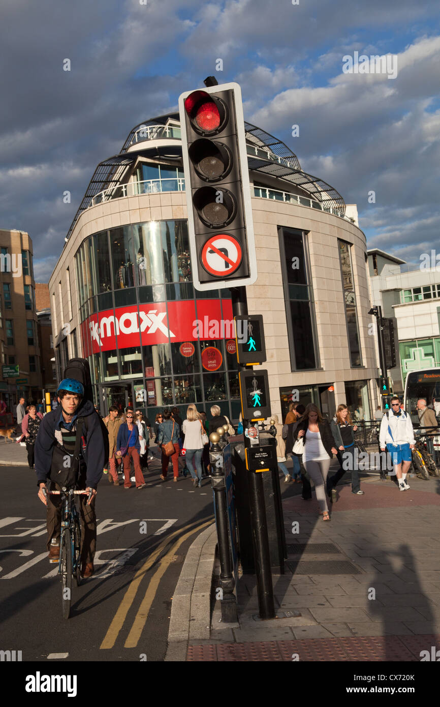 Cyclist goes through a red light Stock Photo - Alamy