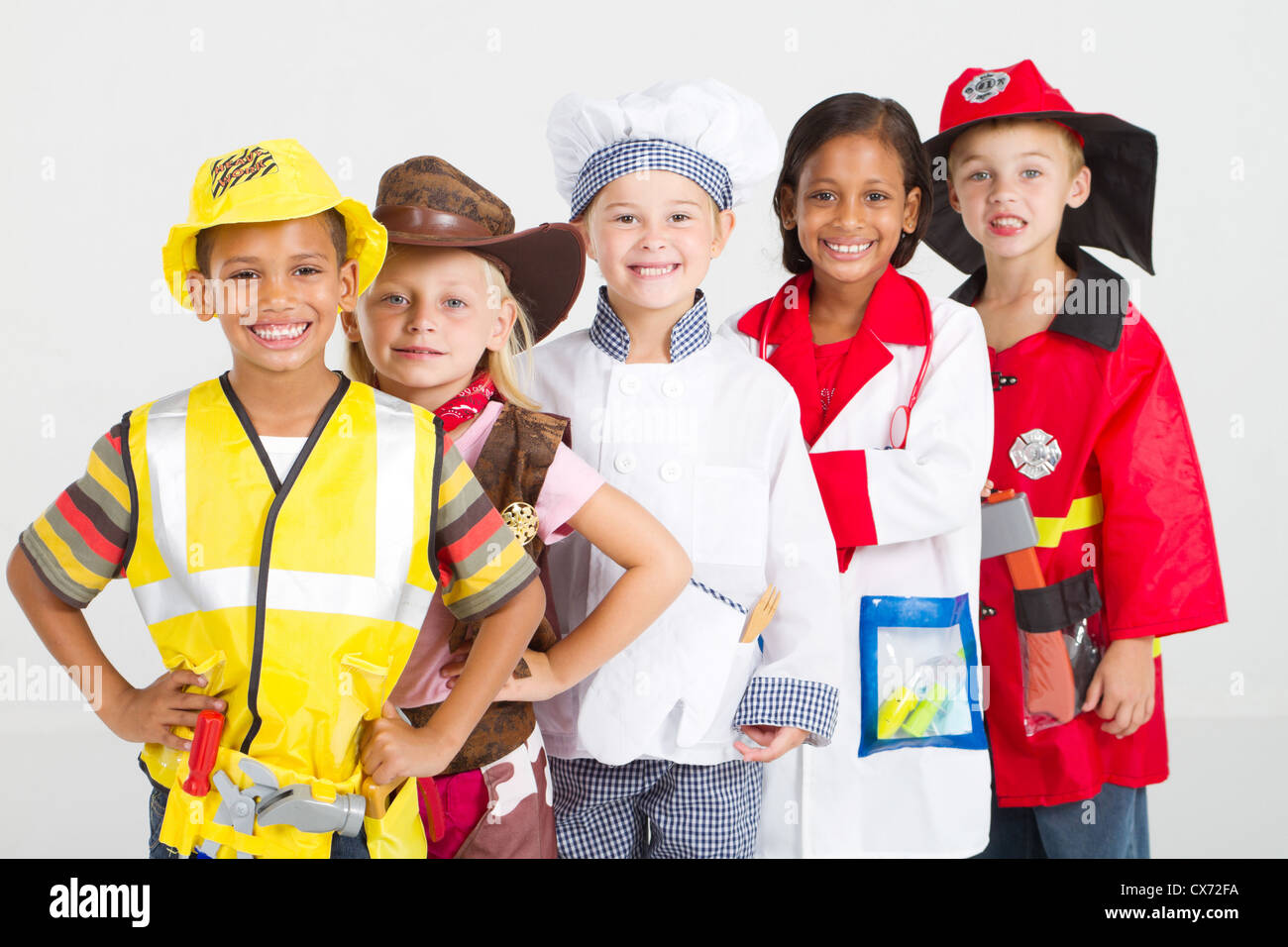 group of kids in uniforms costumes Stock Photo - Alamy