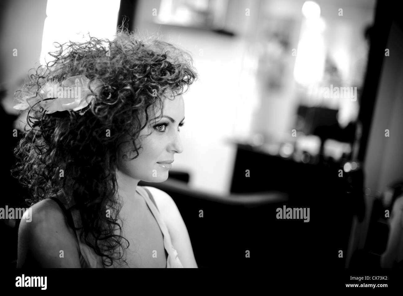 Ravishing girl with curly hair Stock Photo - Alamy