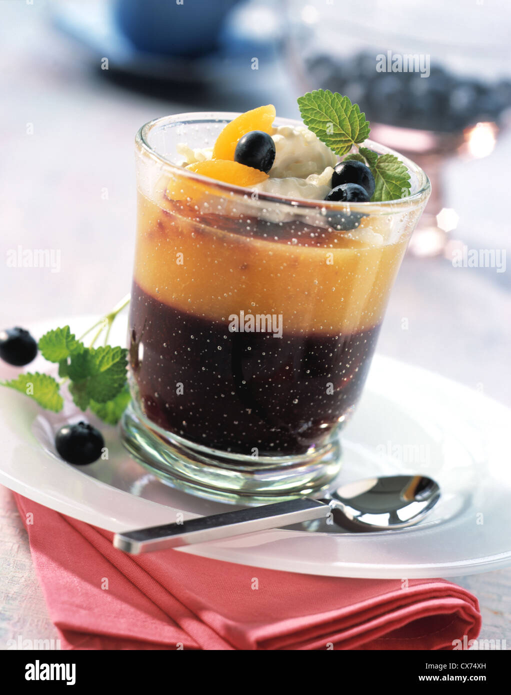 Apricot - blackberry - jelly with cream and milk - rice toppings Stock ...