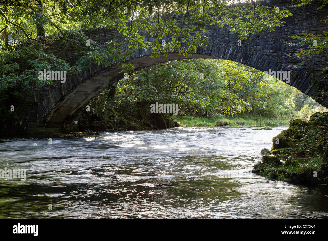 The River Brathay flowing under the bridge to Brathay Church, Brathay ...