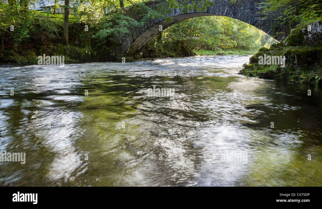 The River Brathay flowing under the bridge to Brathay Church, Brathay ...