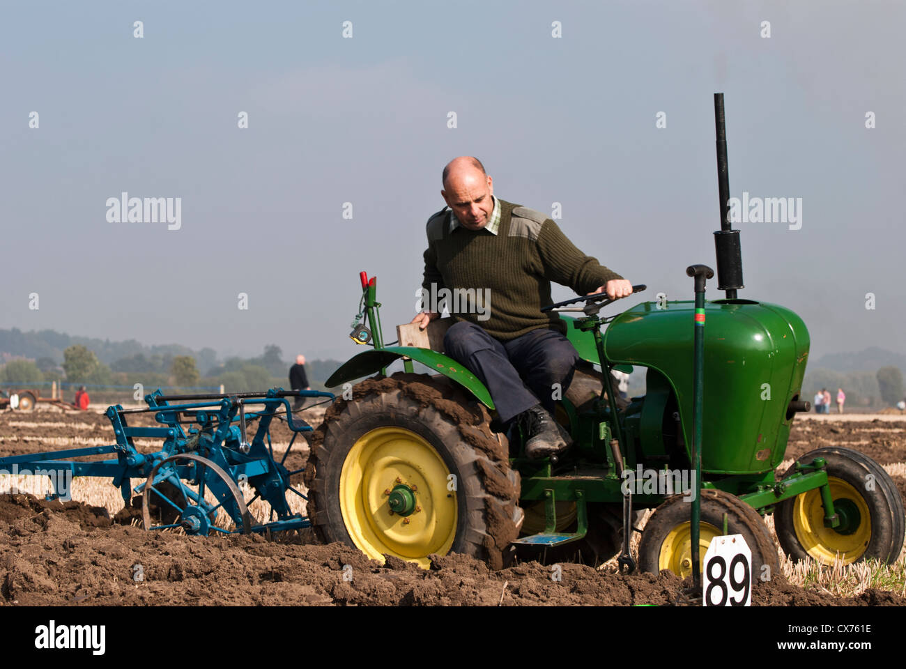 A farmer ploughing with a Crawley 75 vintage tractor, Bulcote ...