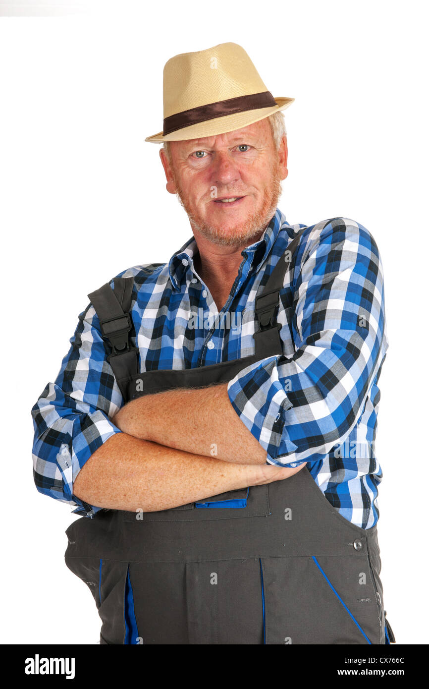senior workman with working wear and straw hat Stock Photo - Alamy