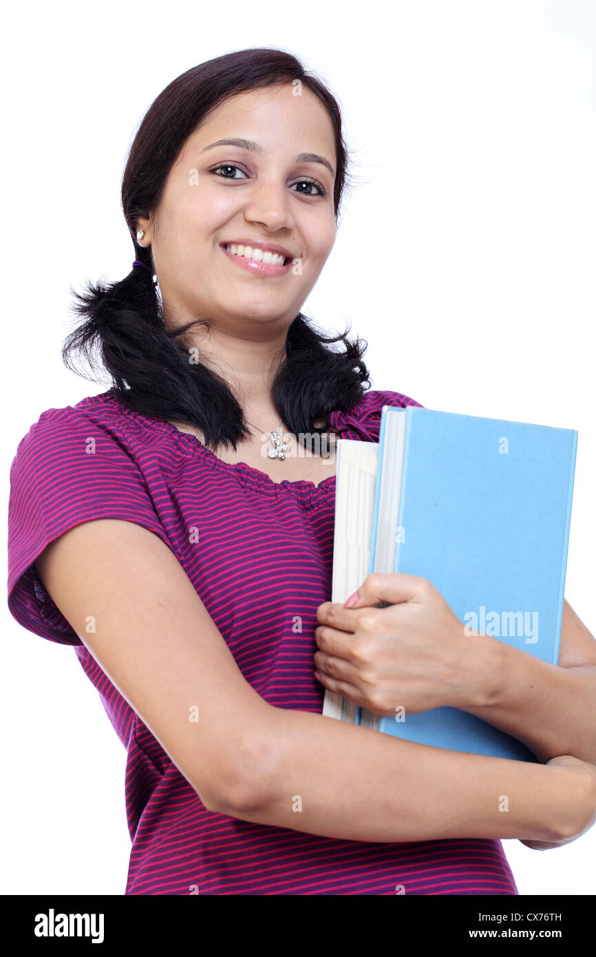 Portrait of Indian college student holding books in her hand Stock ...