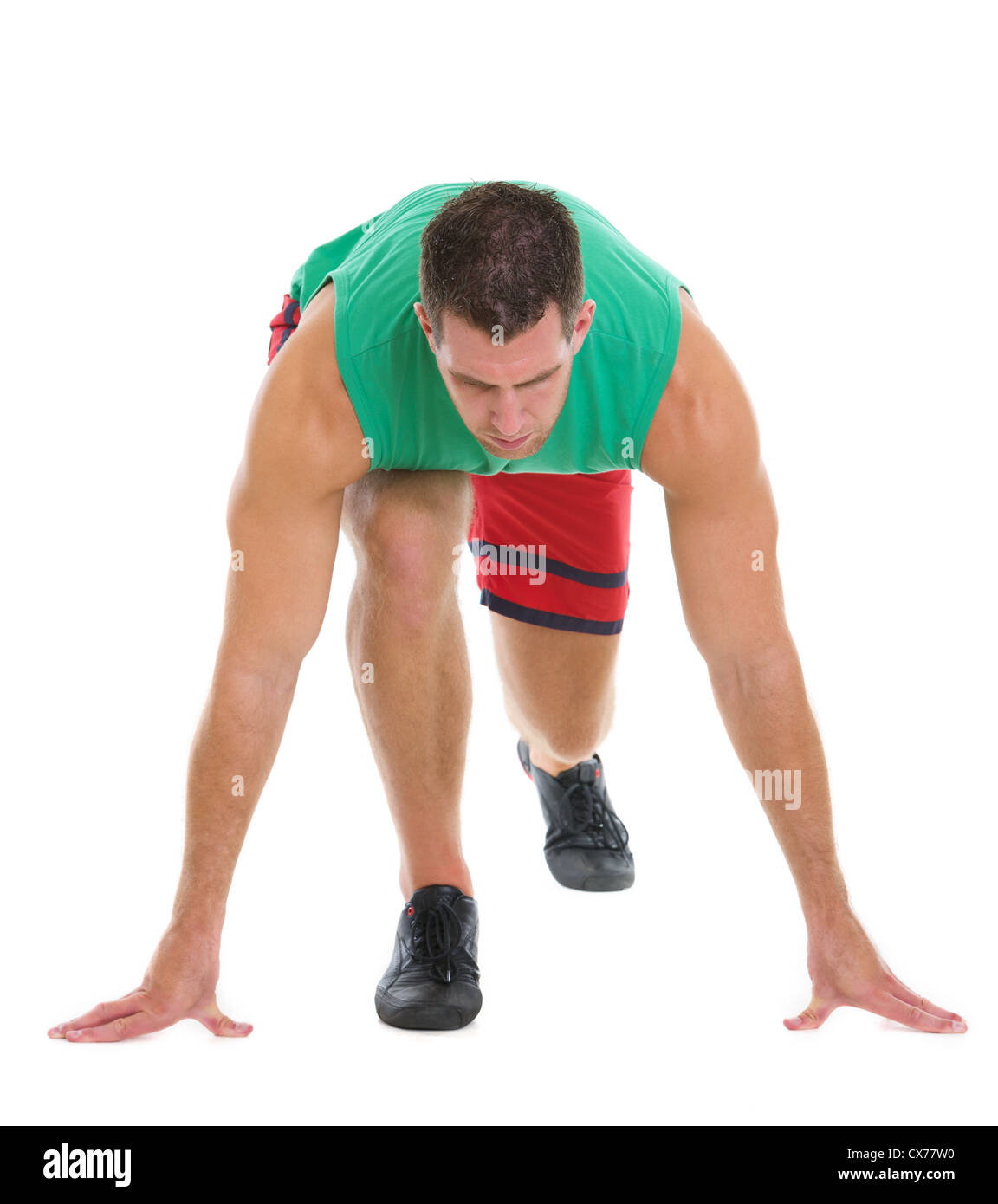 Fitness runner in ready to start position Stock Photo - Alamy