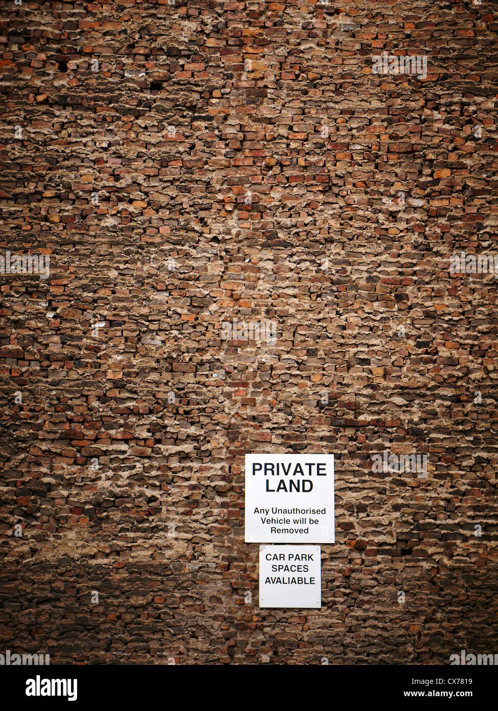 Brick wall texture private land sign hi-res stock photography and ...
