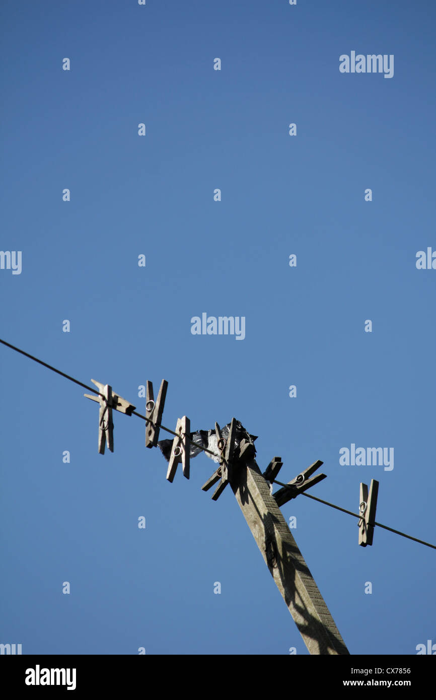 old clothes washing line and blue sky Stock Photo - Alamy