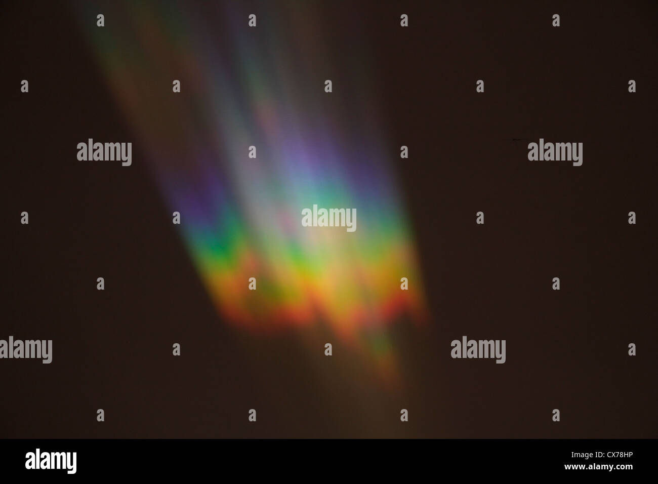 light beam forming spectrum on room ceiling Stock Photo - Alamy