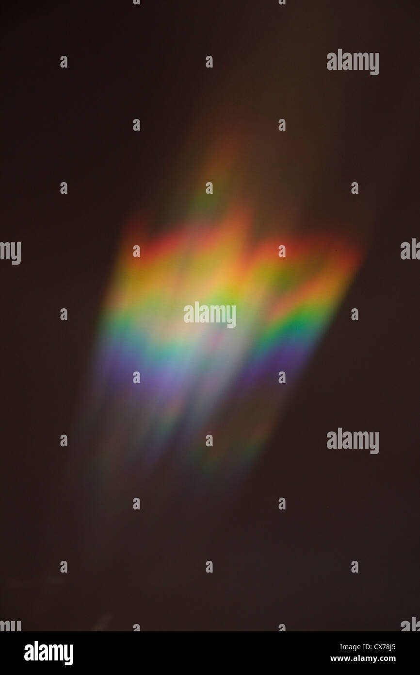light beam forming spectrum on room ceiling Stock Photo - Alamy