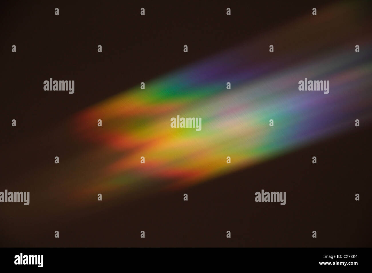 light beam forming spectrum on room ceiling Stock Photo - Alamy