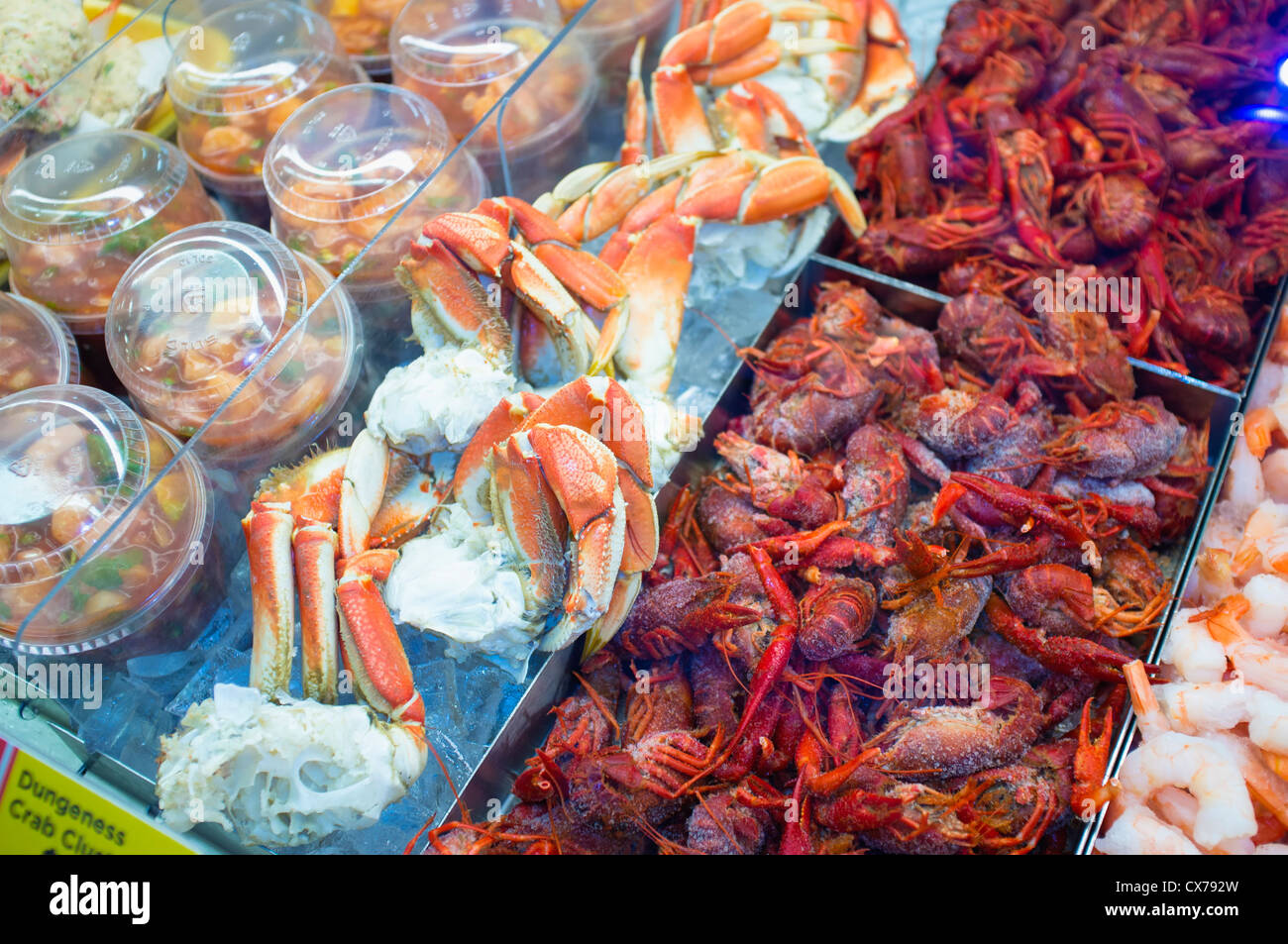 Fresh crawfish and crablegs on display at fresh food store Stock Photo ...