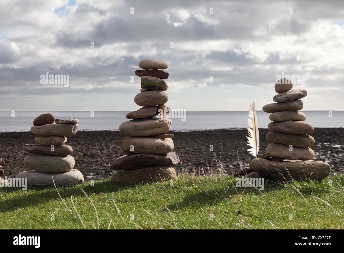 Stone stacks or piles on Holy Island north east England UK Stock Photo ...