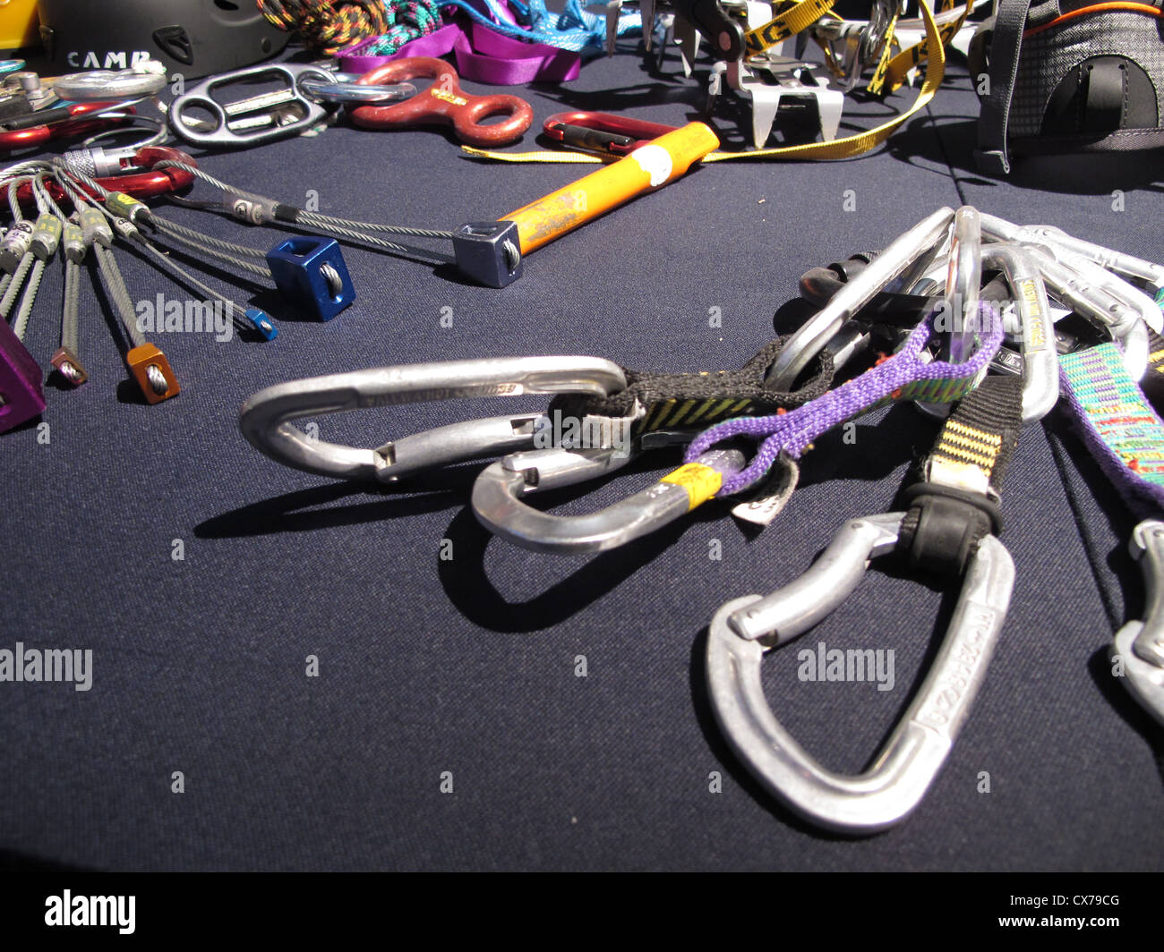 selection of climbing equipment on display at event Stock Photo - Alamy