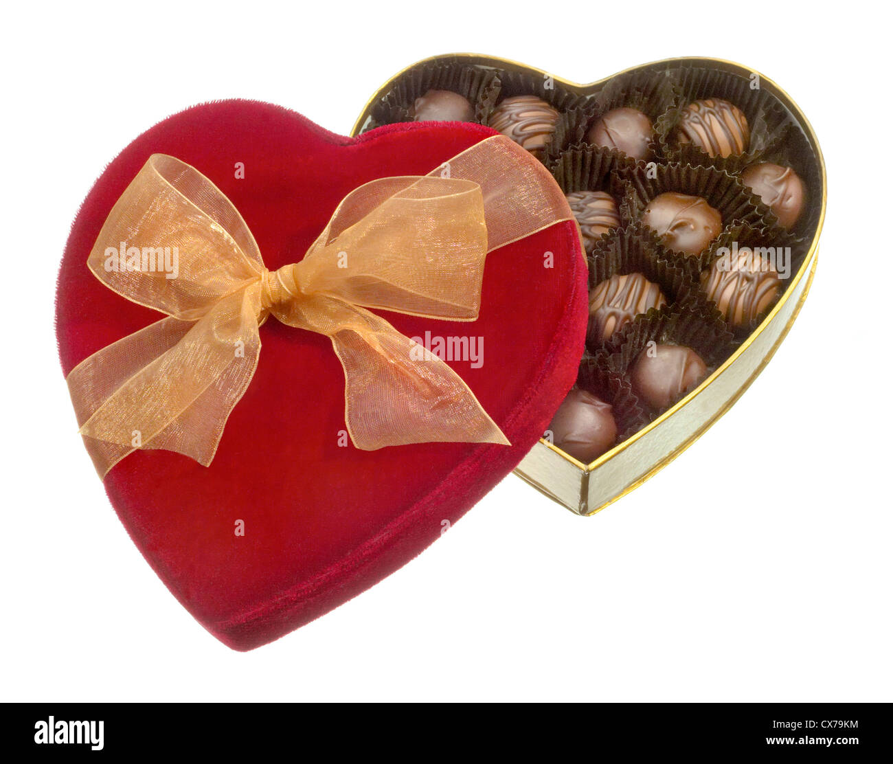 box of chocolates in a red velvet box photographed on a white ...