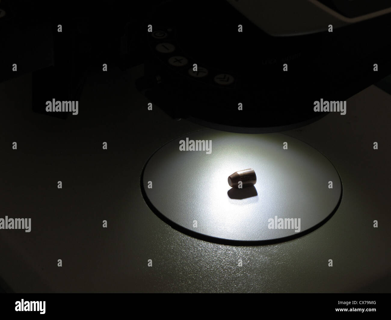 one bullet under a microscope at forensic lab at police event Stock ...