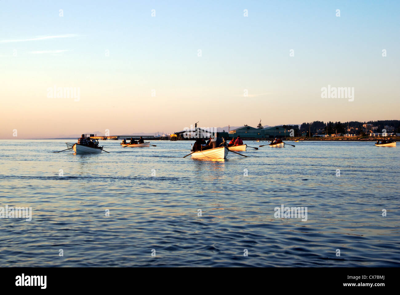 Guides and anglers rowing traditional rowboats to fish for chinook in ...