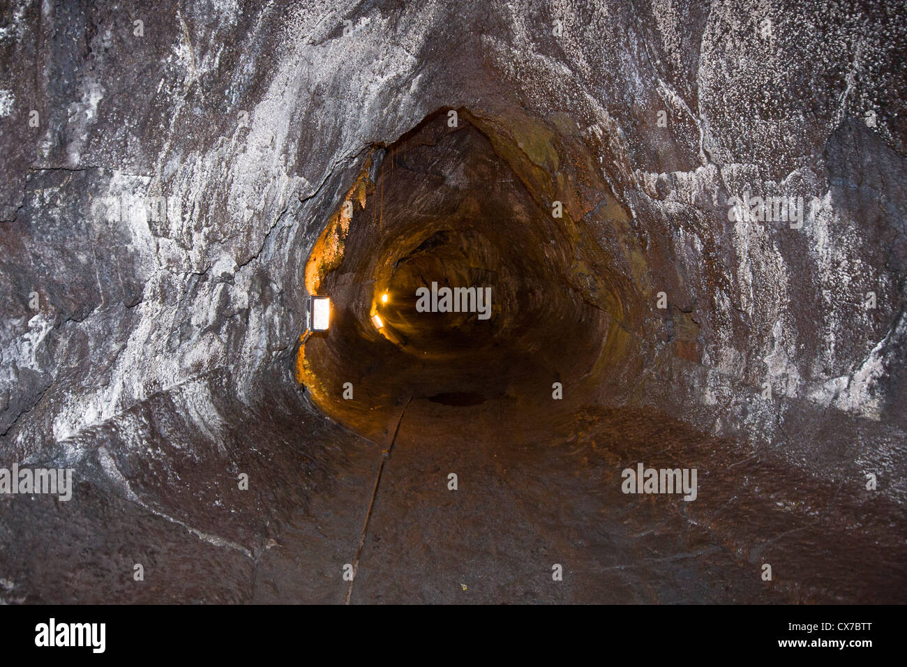 Lava tube - natural conduits through which lava travels beneath the ...
