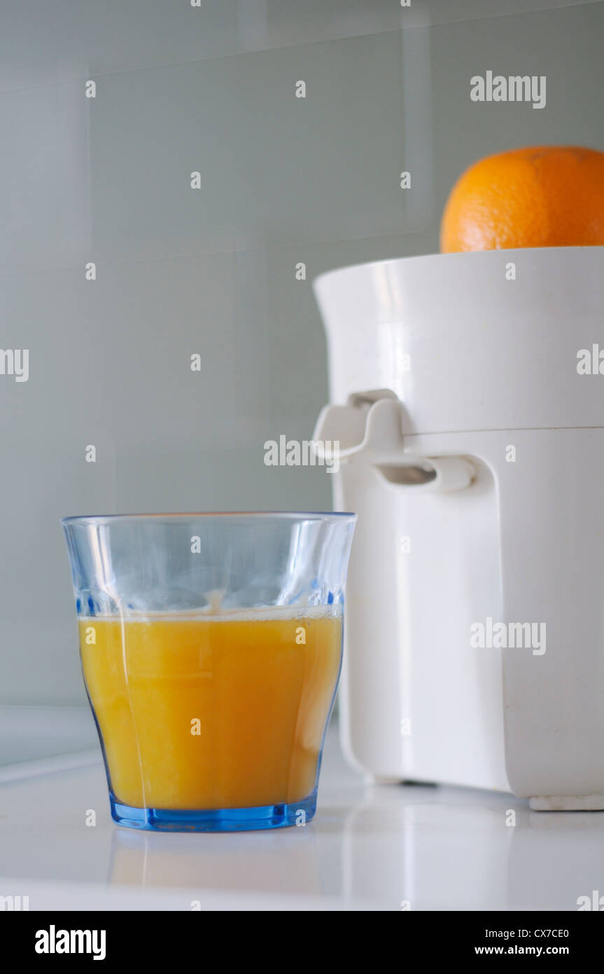 Squeezing machine hi-res stock photography and images - Alamy