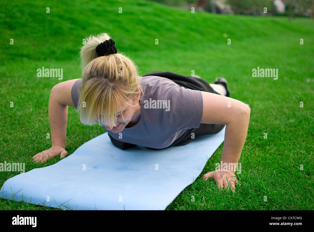 Middle aged woman keeping fit hi-res stock photography and images - Alamy