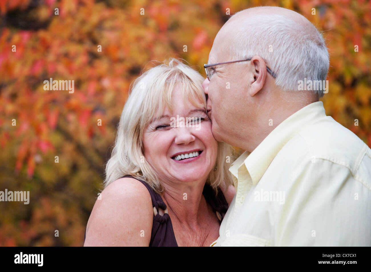 Mature Married Couple Enjoying Spending Time Together In Park During