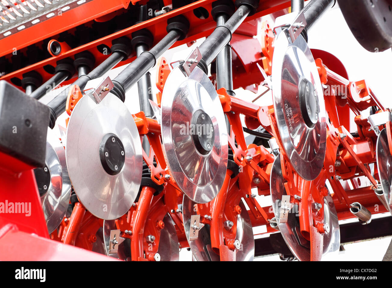Disk harrow sitting for plowing Stock Photo - Alamy