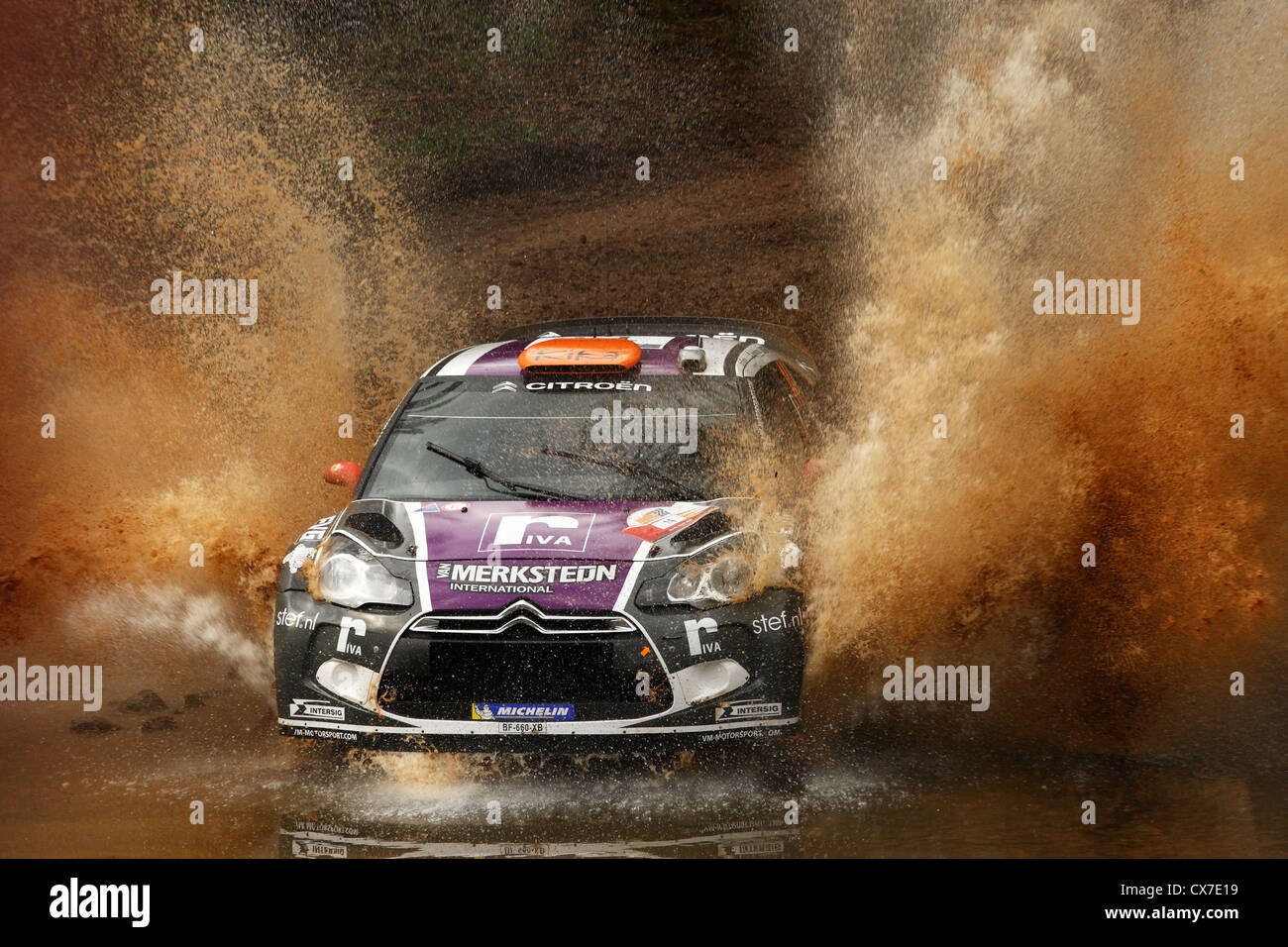 A World Rally Championship car crosses the water during the Coffs ...