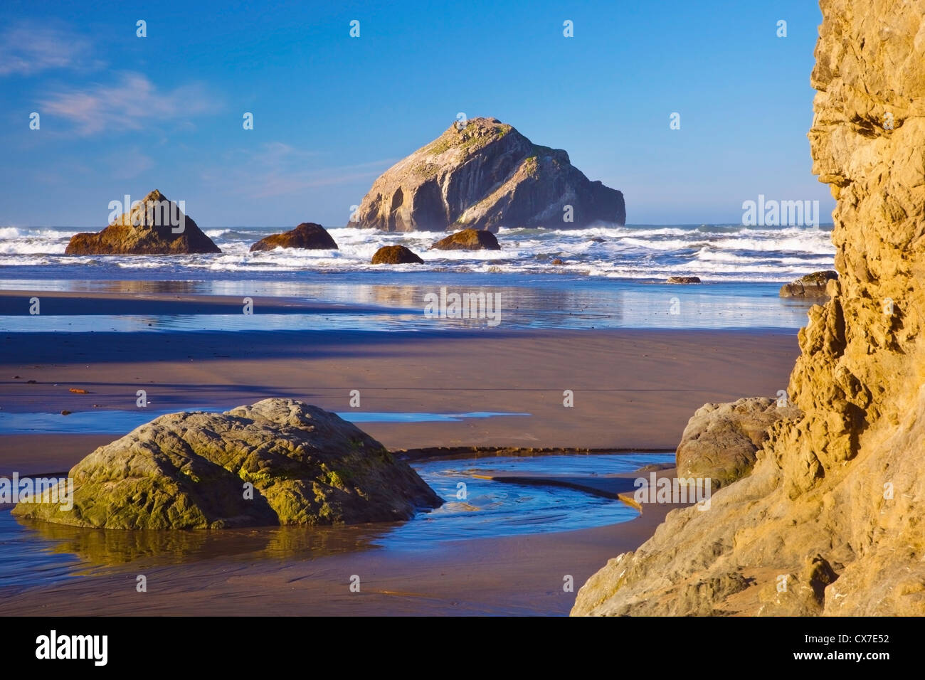 Rock Formations At Low Tide On Bandon Beach; Oregon, United States Of ...