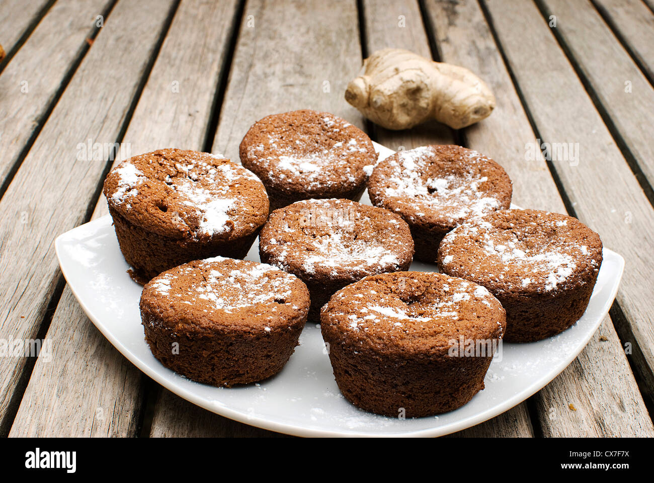 homemade ginger cookies over wooden table with fresh ginger root Stock ...