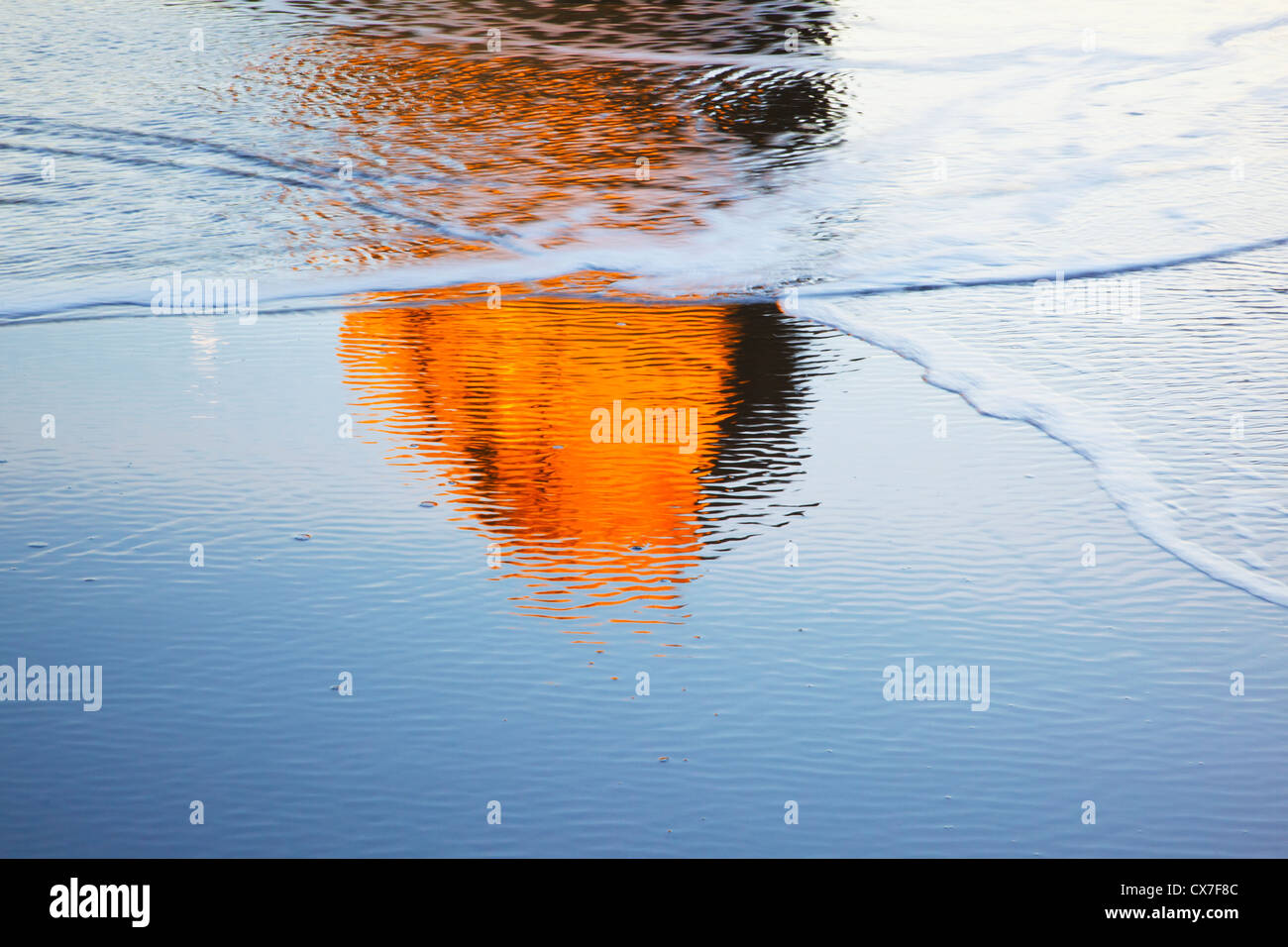 Rock Formation Reflecting In A Tide Pool At Bandon Beach; Oregon ...