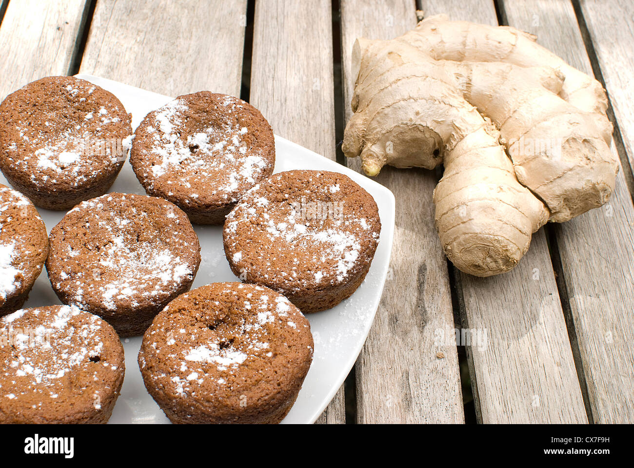 homemade ginger cookies over wooden table with fresh ginger root Stock ...