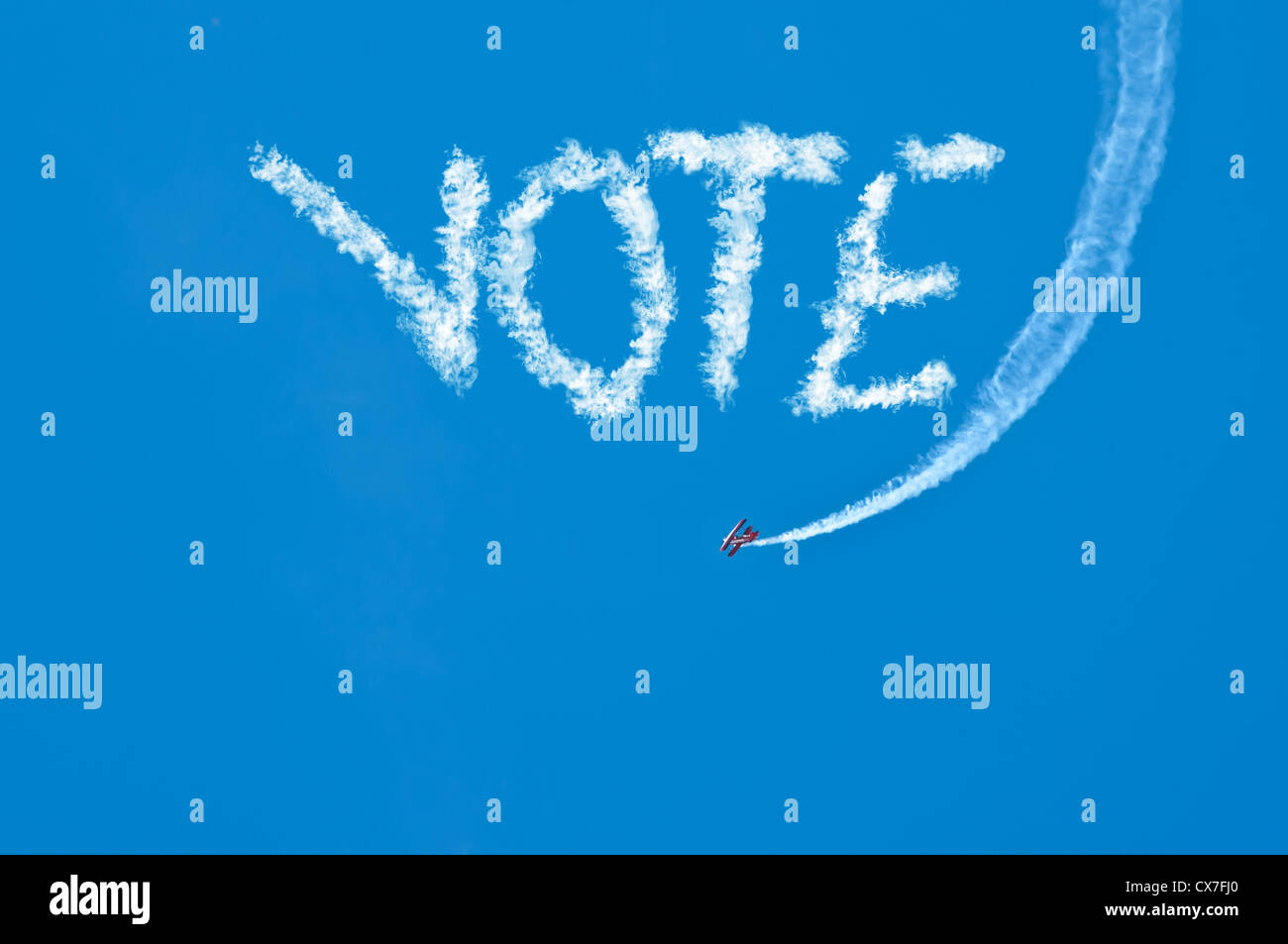Biplane Sky Writing Vote Stock Photo - Alamy