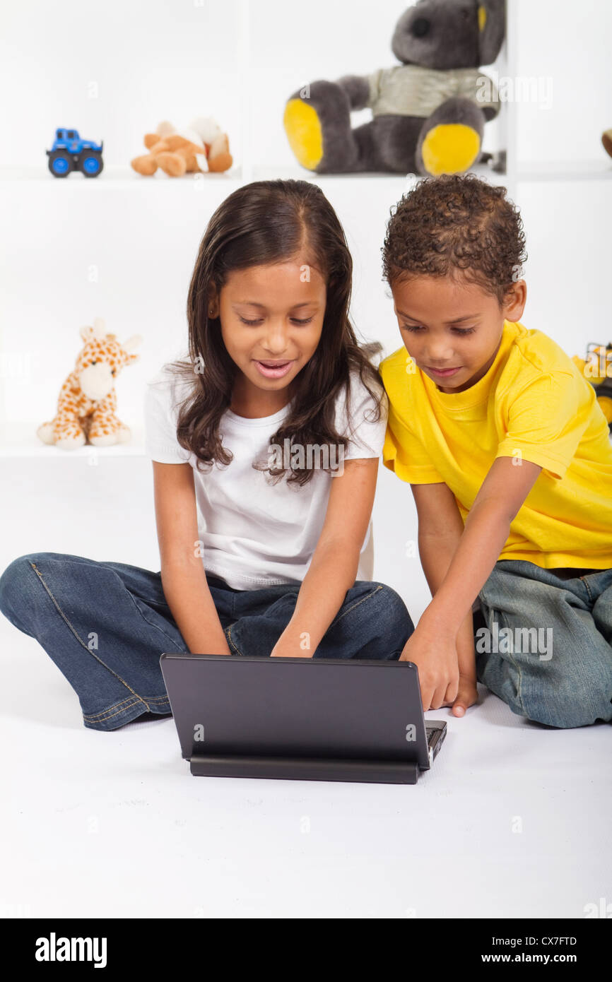 african american brother and sister playing laptop computer Stock Photo ...
