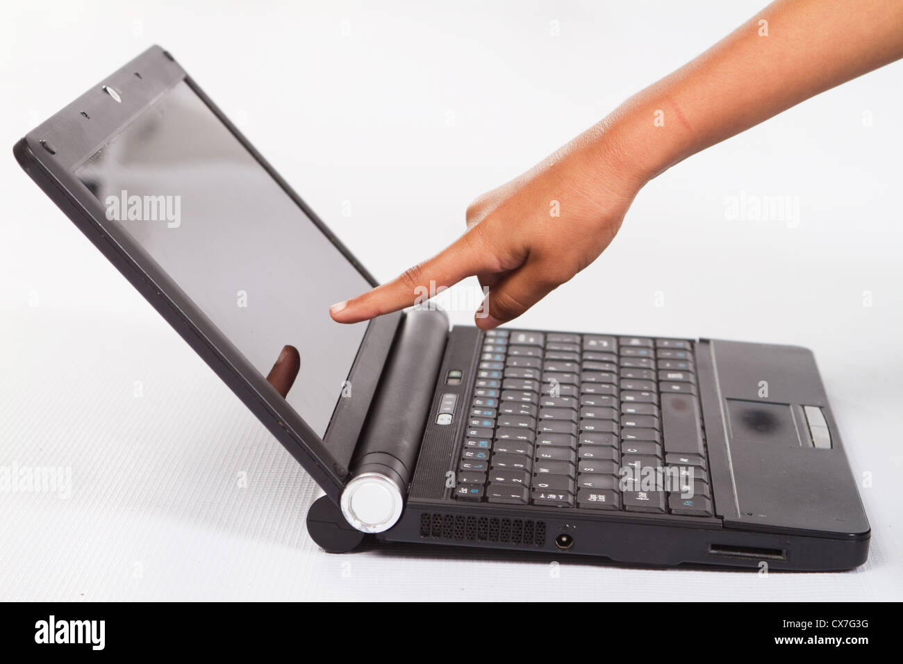 kid hand point at laptop screen Stock Photo - Alamy