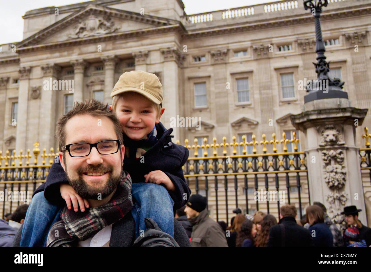 Father And Son Outside Buckingham Palace; London, England Stock Photo ...
