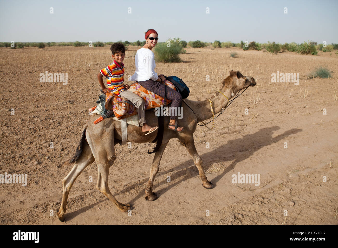 Woman riding camel hi-res stock photography and images - Alamy