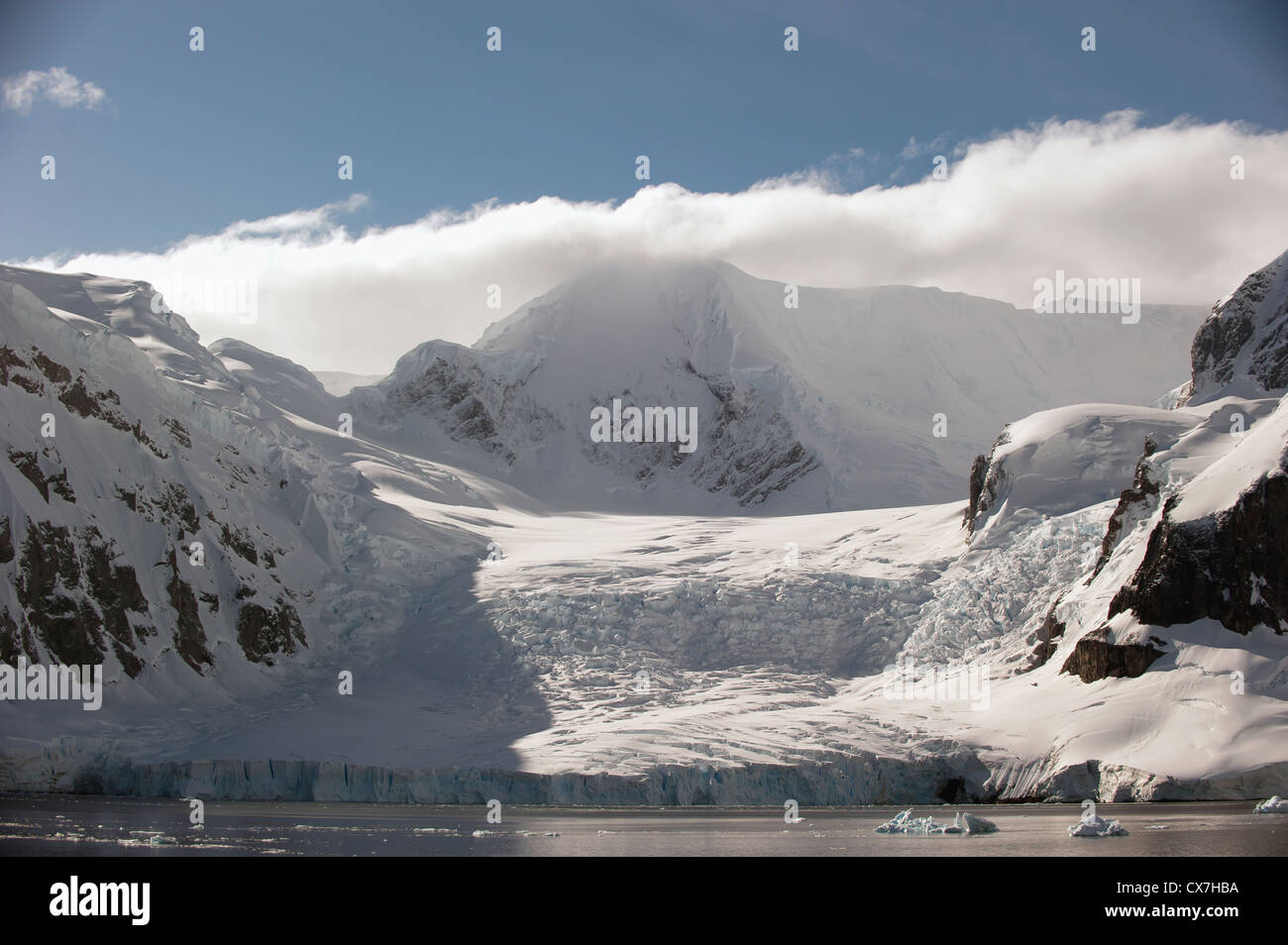 Icebergs And Glaciers On The Mountains Along The Coastline; Antarctica ...