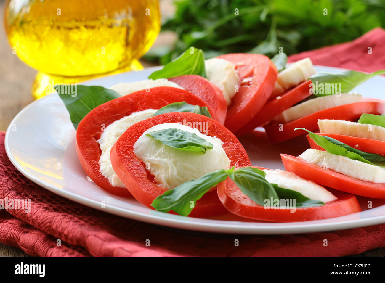 Italian salad with mozzarella cheese and tomato Stock Photo - Alamy