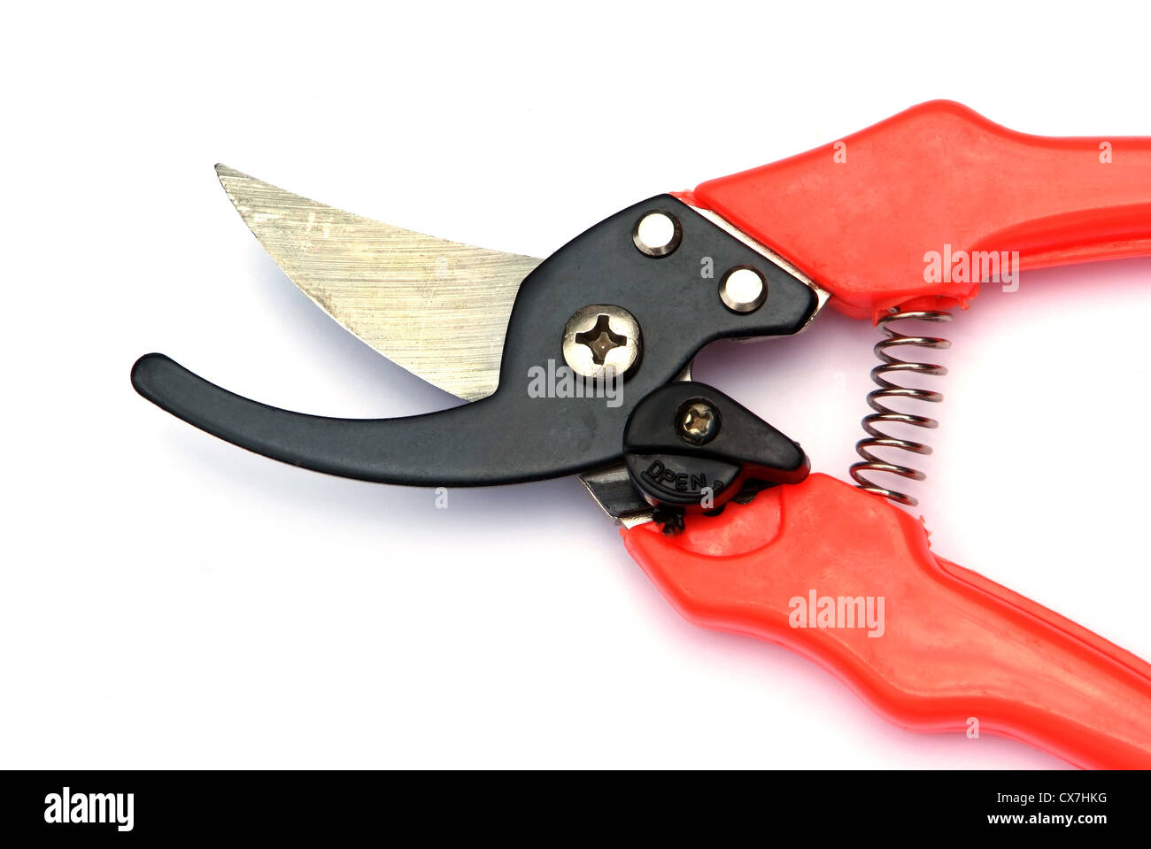 Red garden secateurs isolated on a white background Stock Photo - Alamy