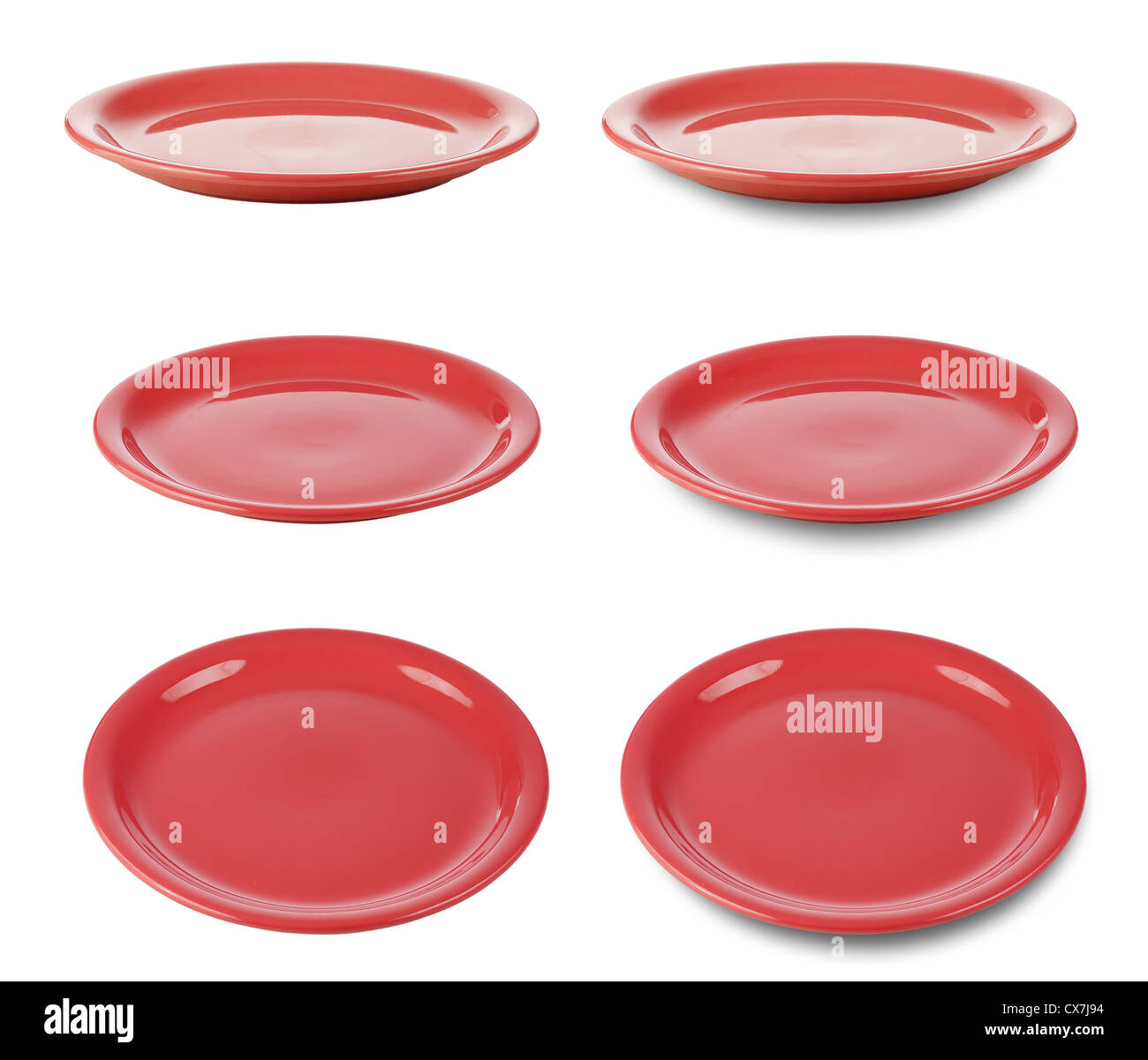 Set of red round plates or dishes isloated on white with clipping path ...