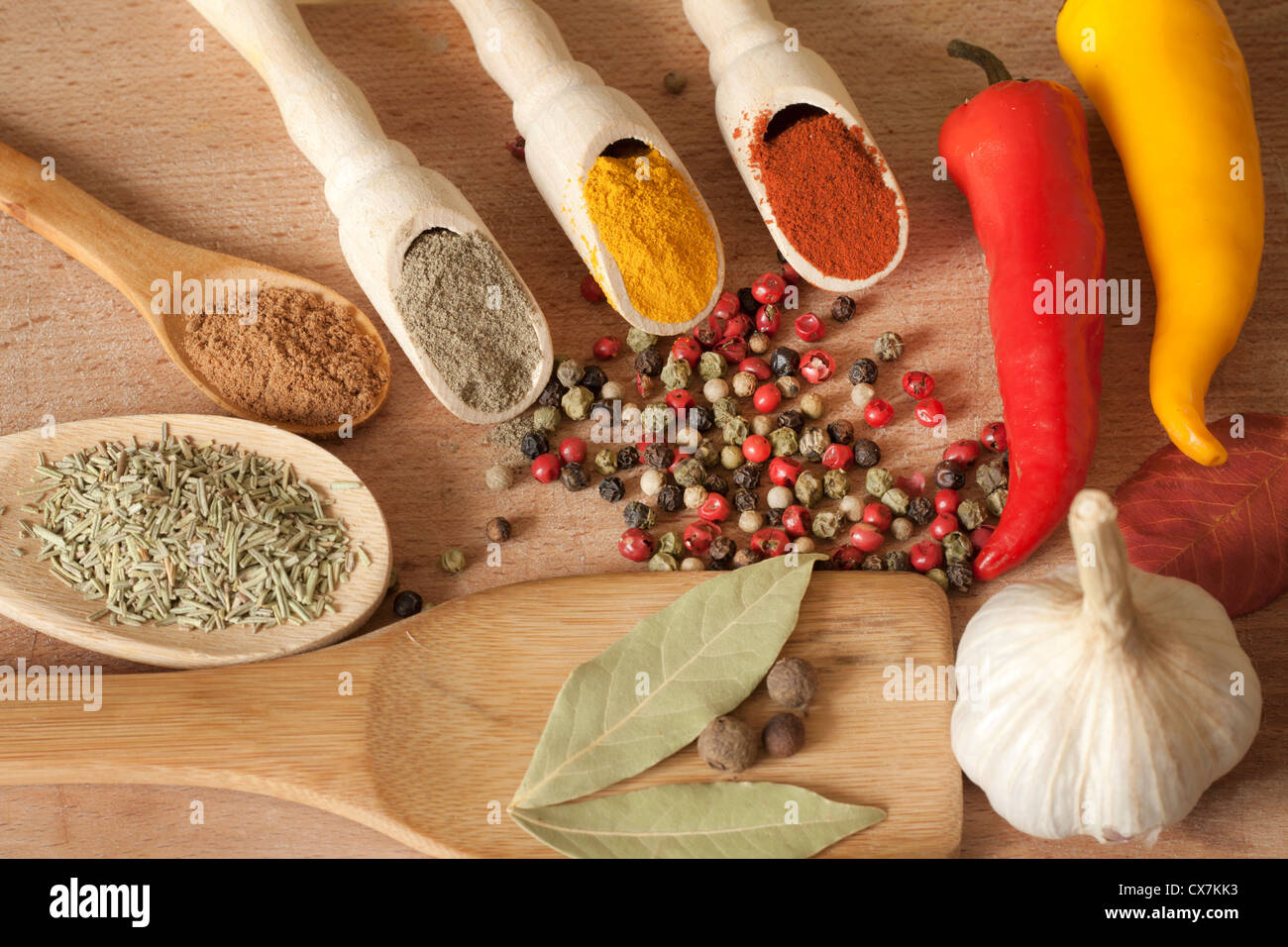 Hot spices herbs and vegetables on desk in kitchen Stock Photo - Alamy