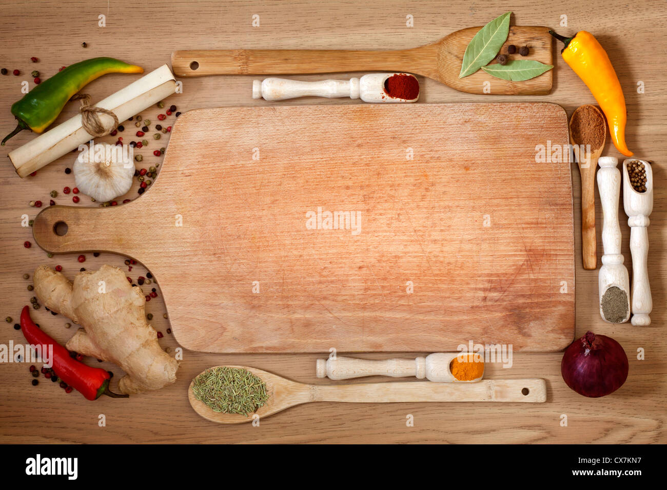 Vegetables and spices border and empty cutting board Stock Photo - Alamy